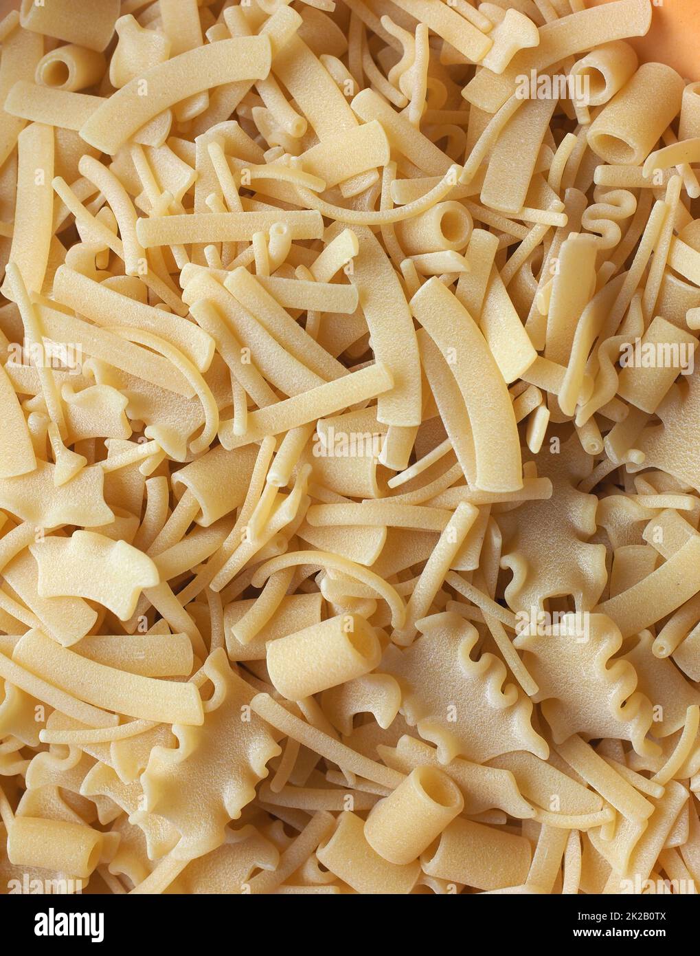 mixed pasta of various shapes background Stock Photo - Alamy