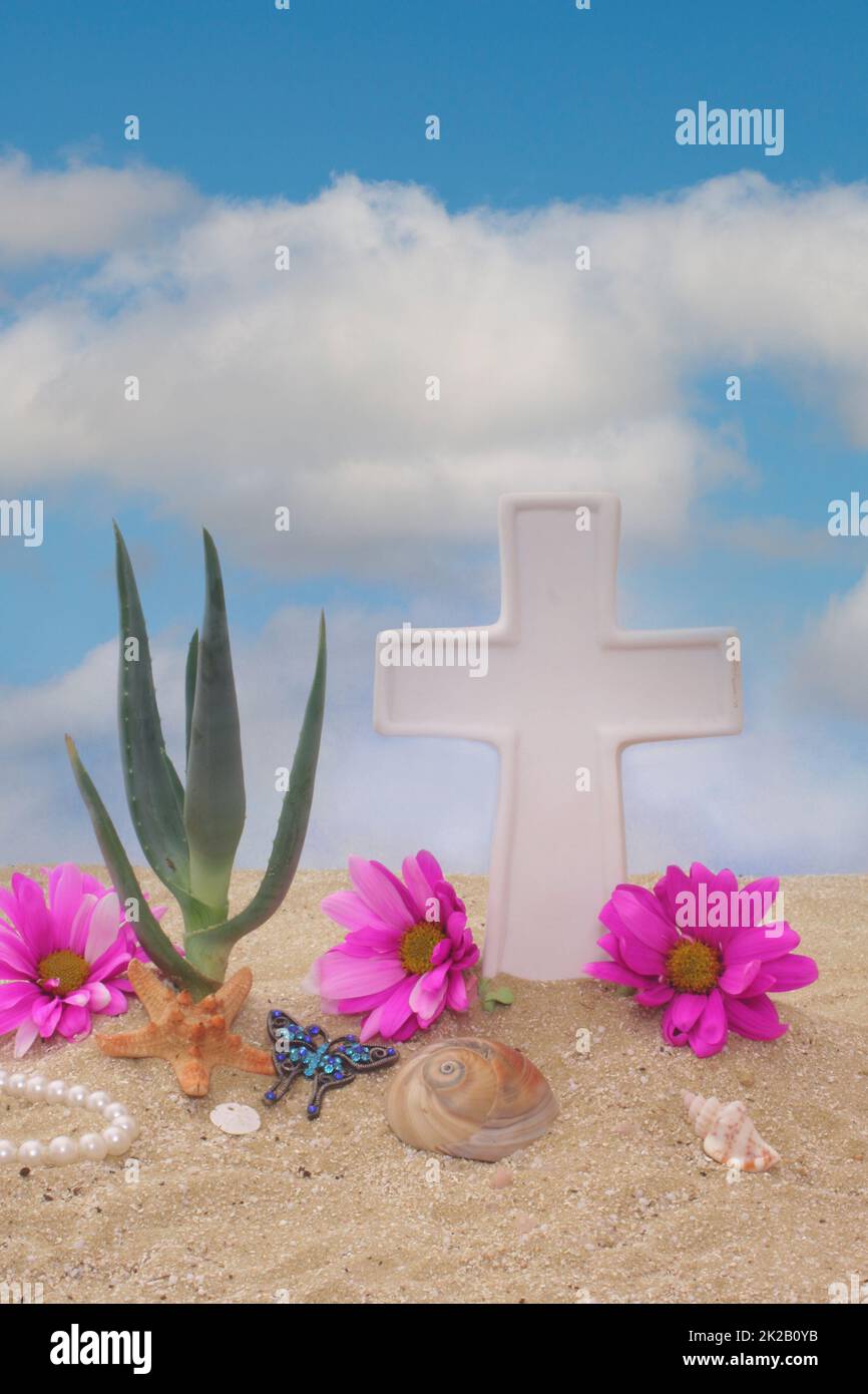 Sea Shells and Flower on Sand With Cross Stock Photo - Alamy