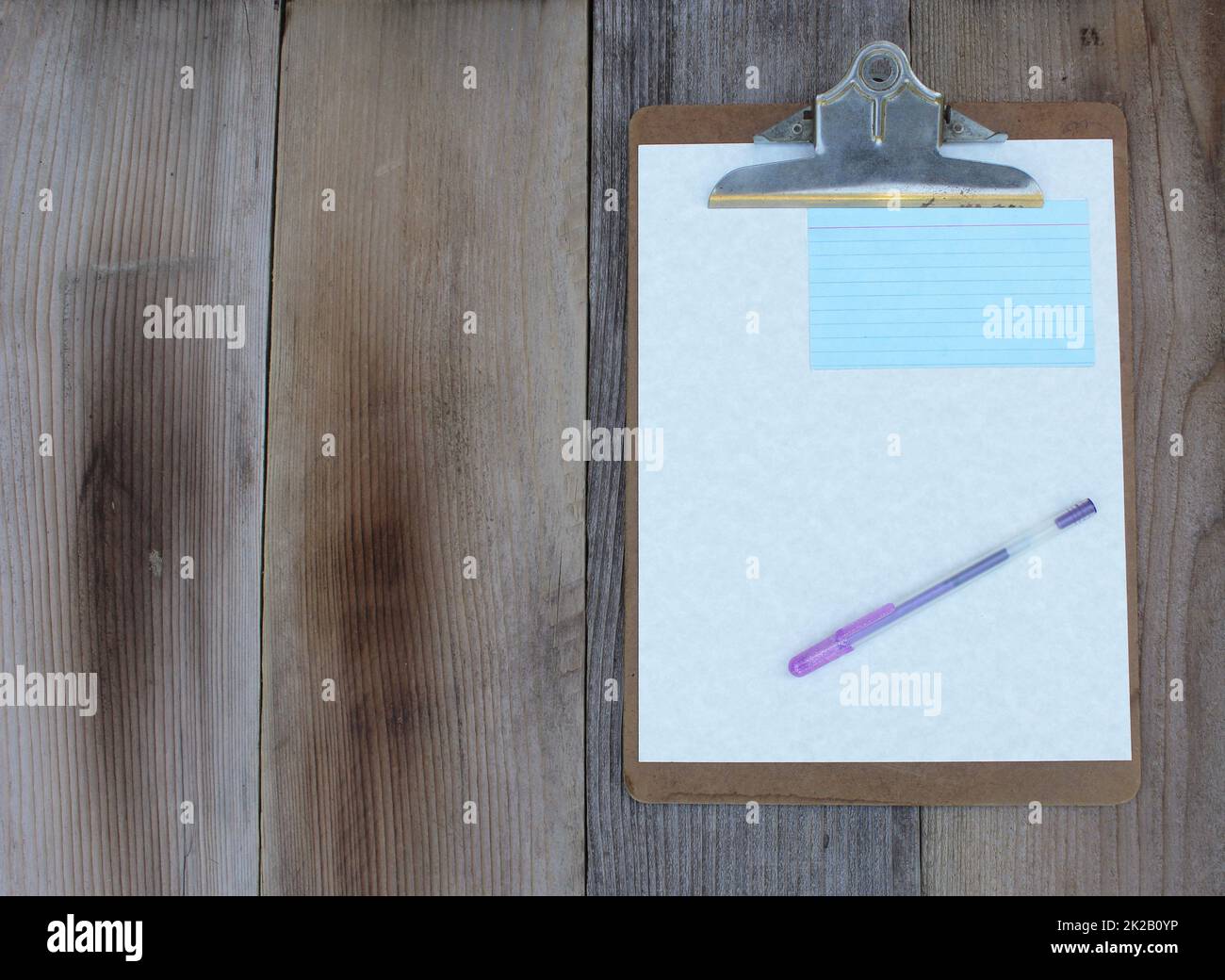 Clipboard With Blank Sheet of Paper on Wooden Table Stock Photo - Alamy