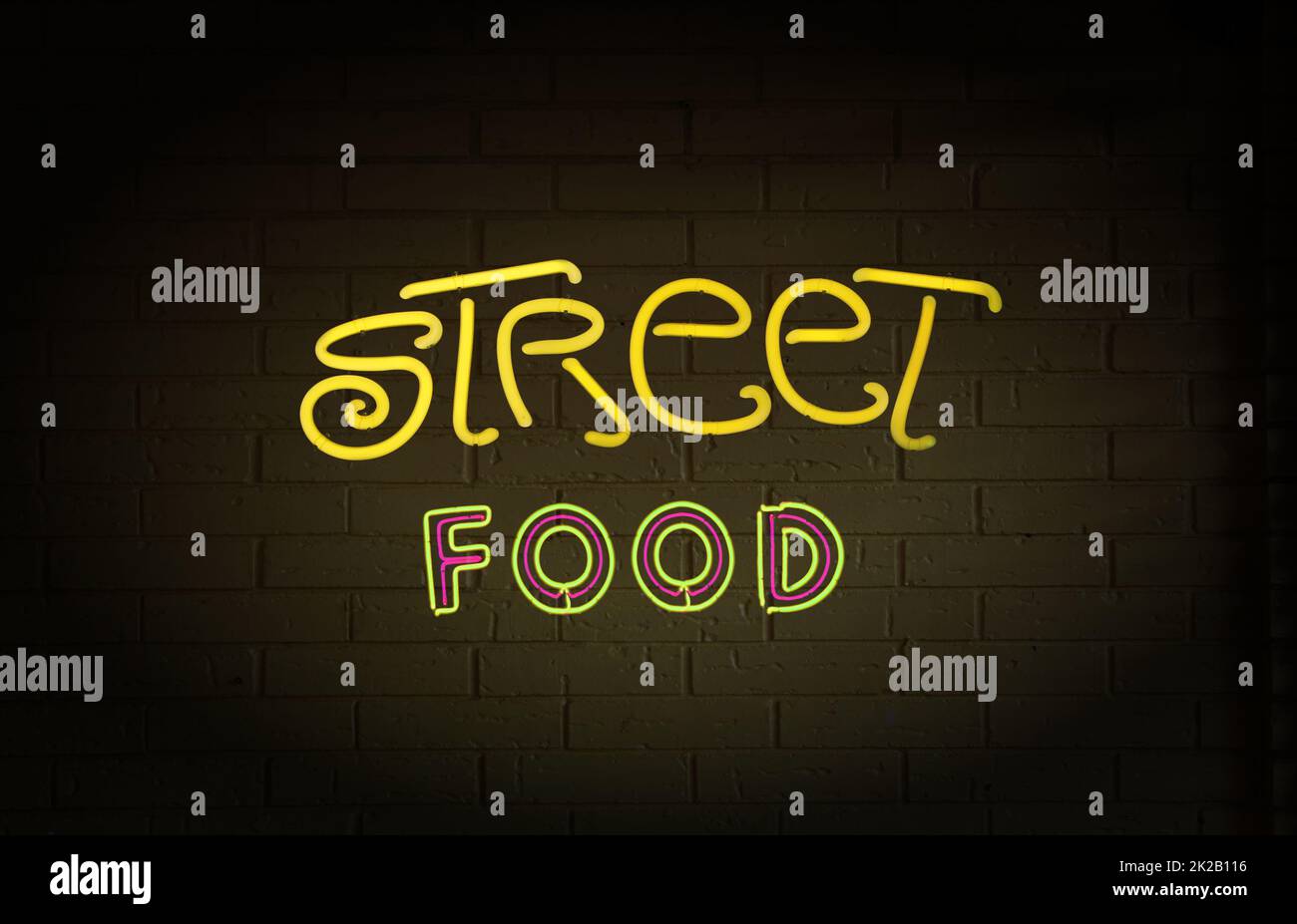 Neon Street Food Sign on Brick Wall Stock Photo - Alamy