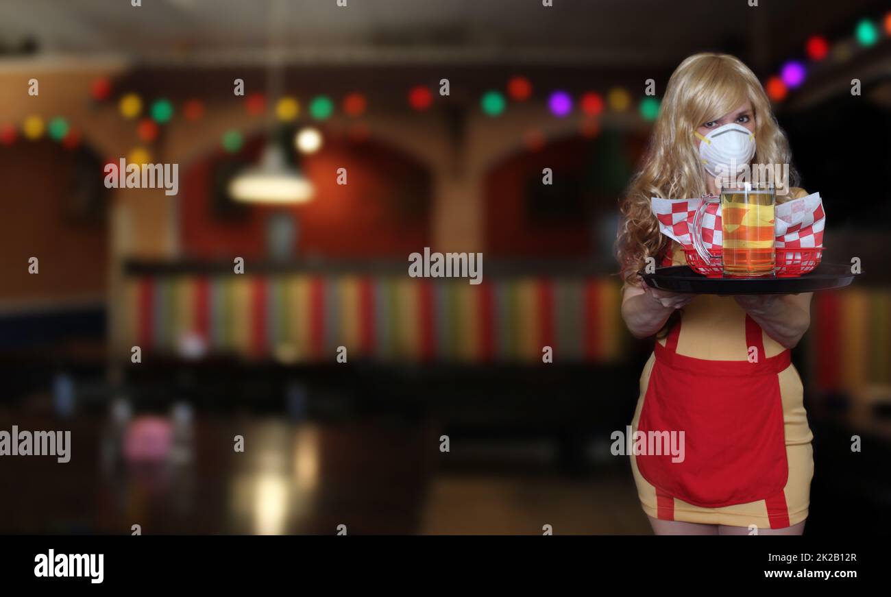 Waitress With Face Mask and Restaurant Background Stock Photo - Alamy