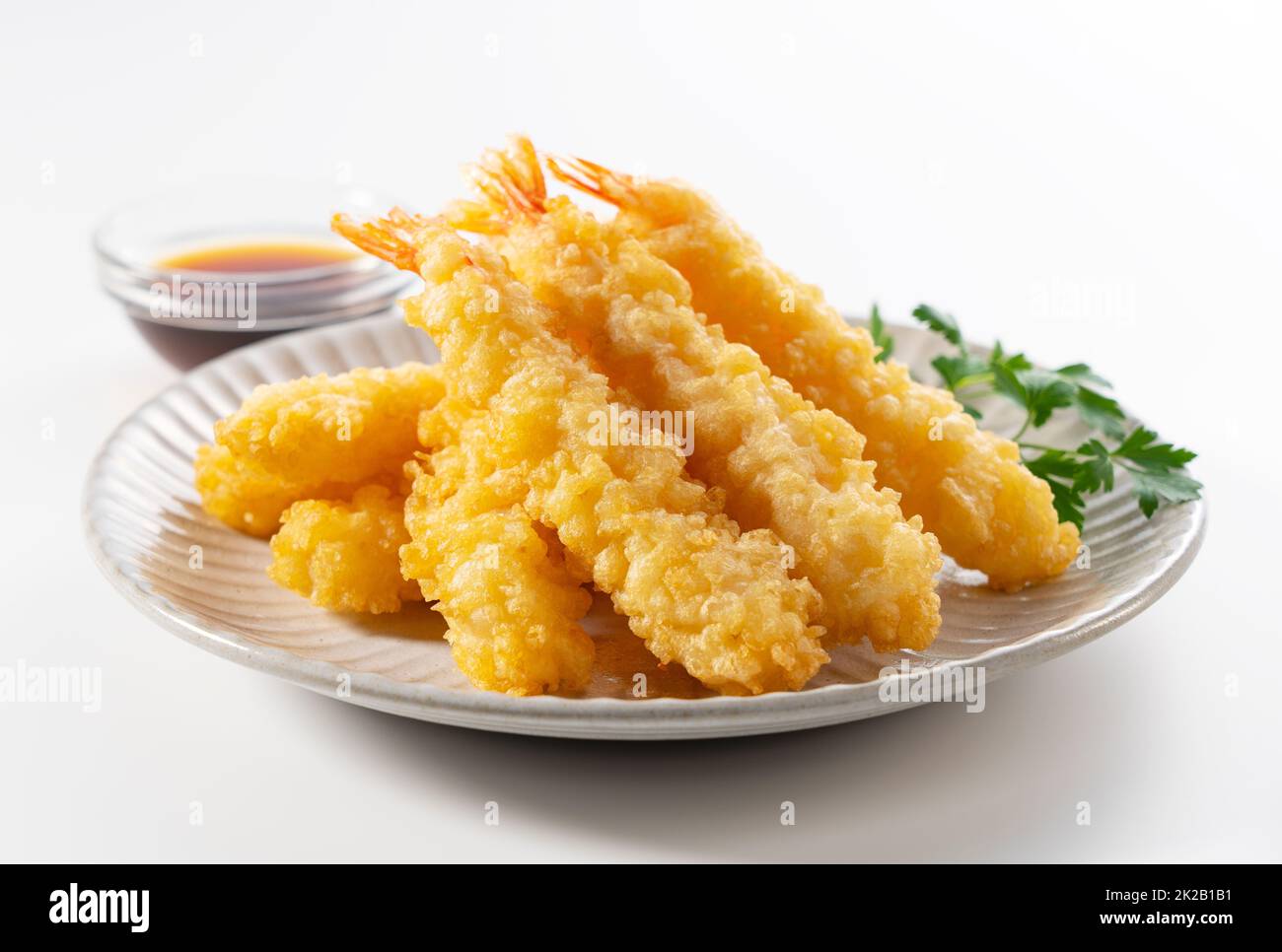 Shrimp tempura on a plate placed on a white background Stock Photo - Alamy
