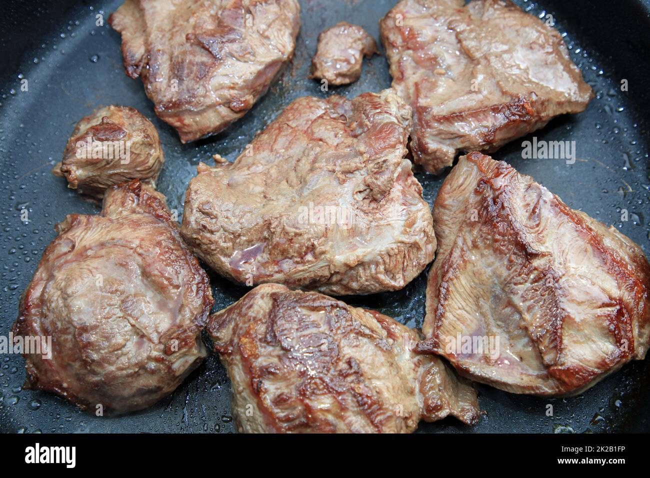 Cooking fresh beef cheeks in Germany Stock Photo - Alamy
