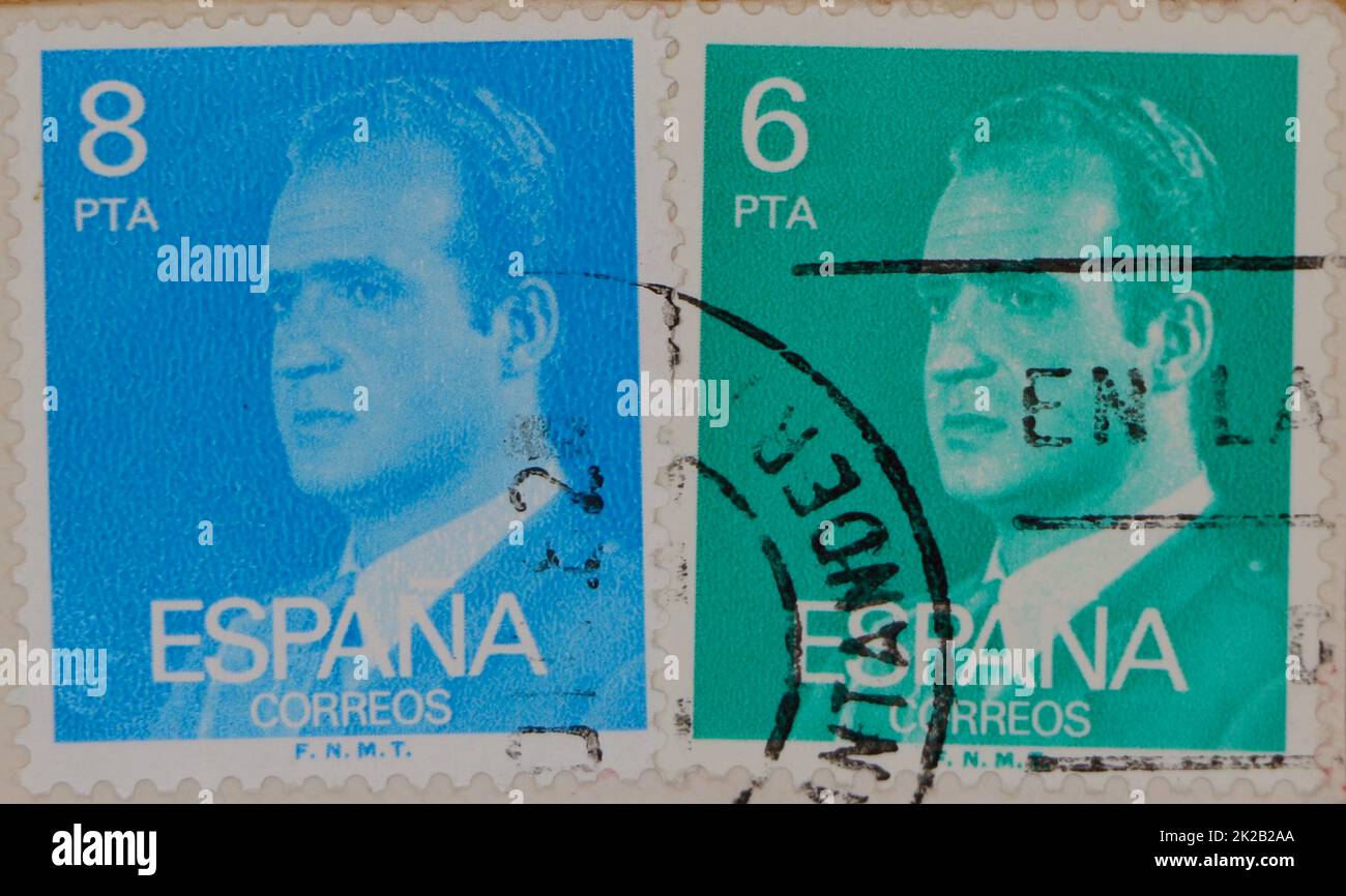 Photo of two Spanish postage stamps blue 8 pesetas and green 6 pesetas ...