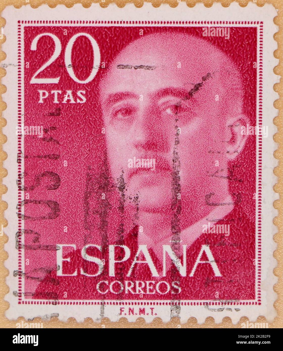 Photo of a red 20 pesetas Spanish postage stamp featuring an image of ...
