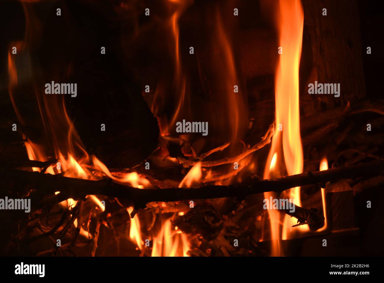 Cozy and warming log fire in the fireplace, in the province of Alicante ...