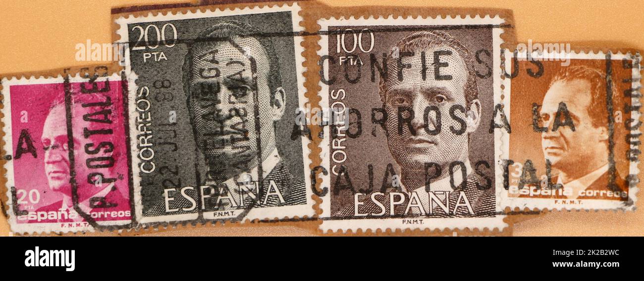 Photo of four old peseta denominated Spanish postage stamps featuring ...