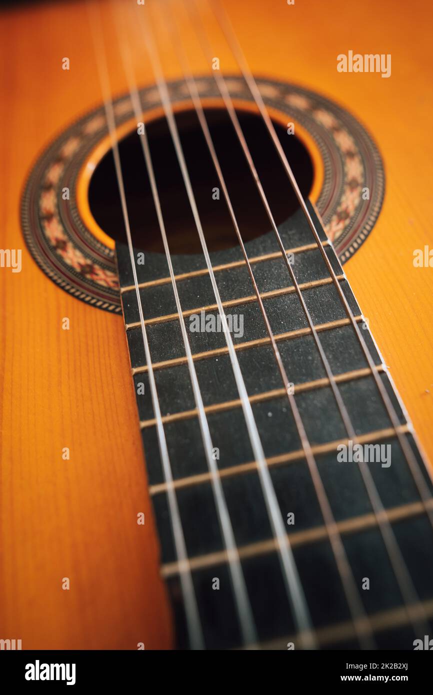 Wooden classical guitar, with plastic strings Stock Photo - Alamy