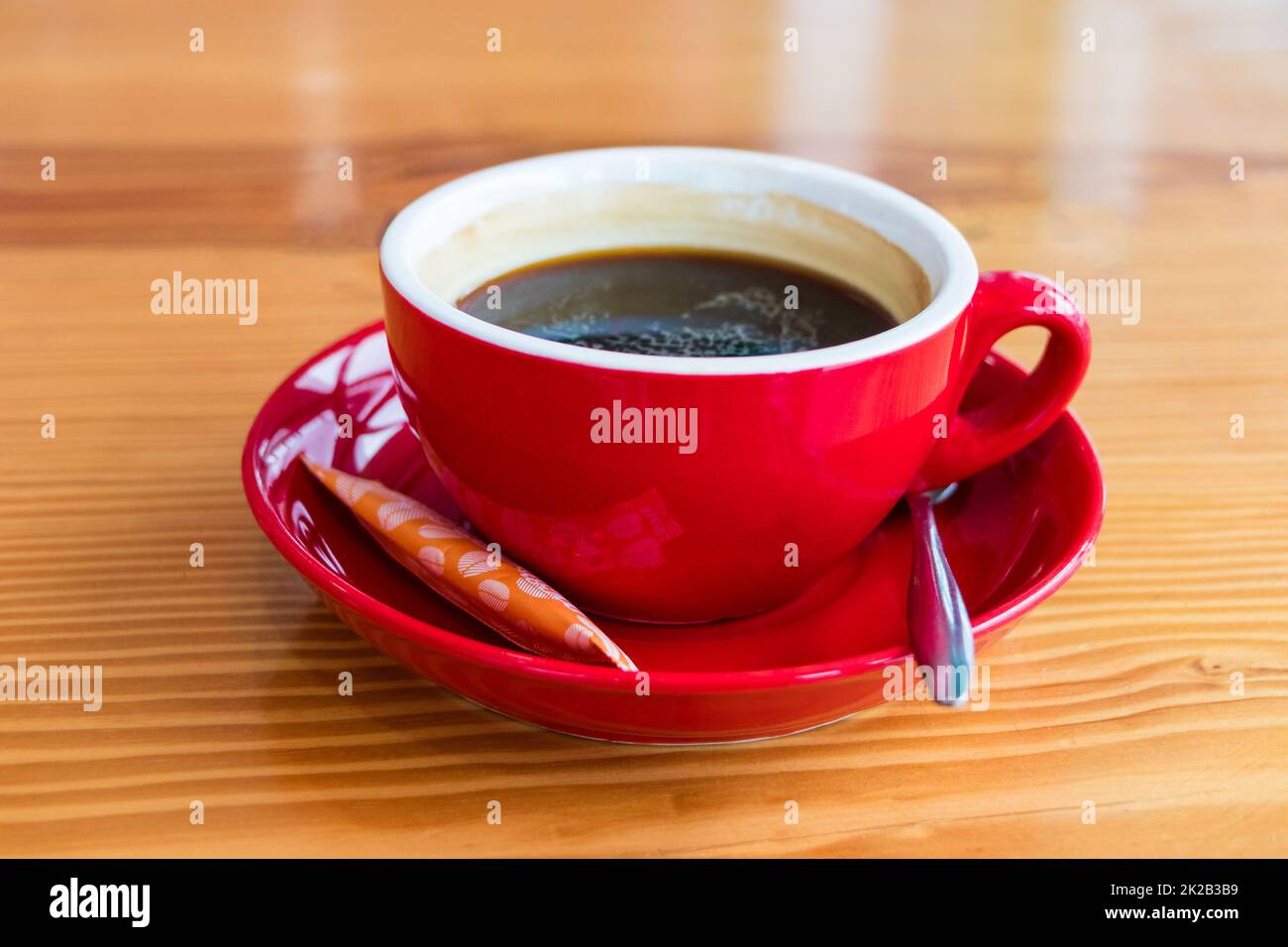 Organic black coffee Vietnam in a red cup Stock Photo - Alamy