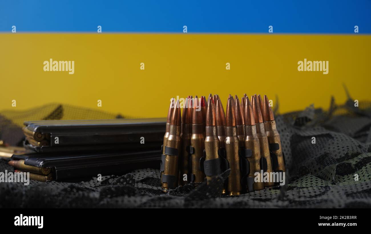 Blue-yellow flag of Ukraine National symbol and 5.56mm ammunition ...