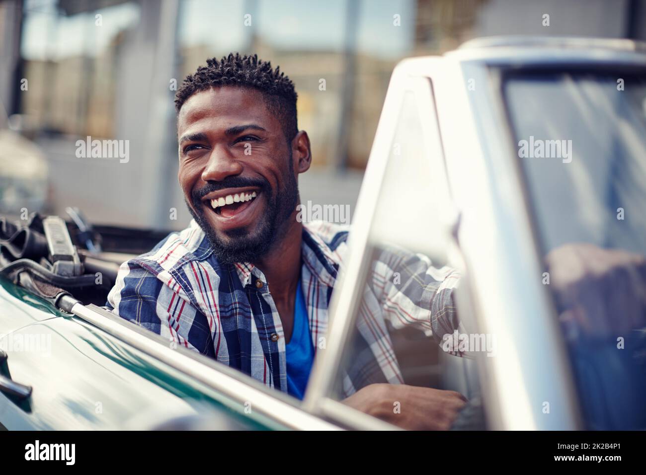 Young man driving vehicle hi-res stock photography and images - Alamy