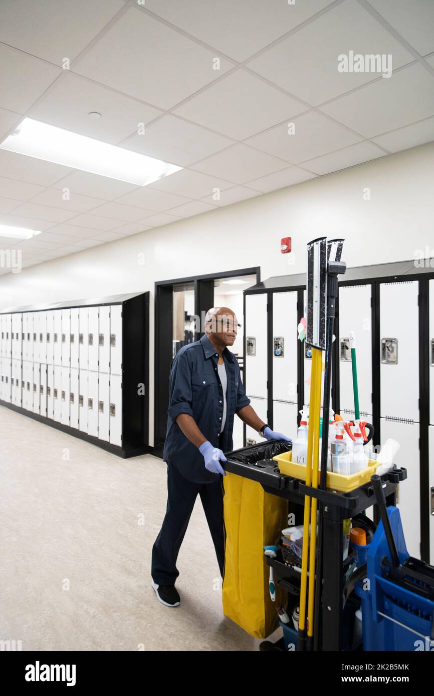 Push pushing trolley hi-res stock photography and images - Alamy