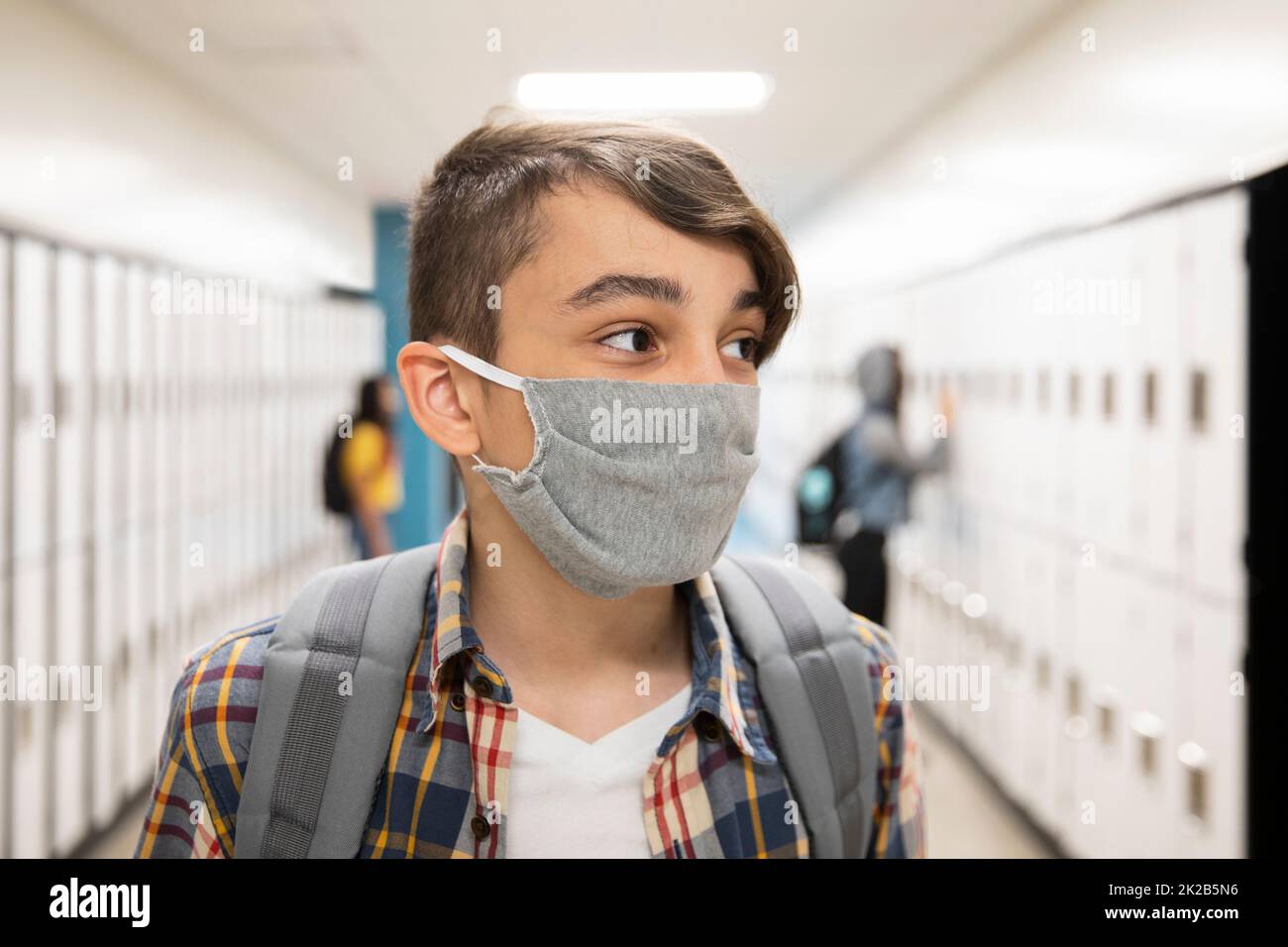 Wearing face mask at school hi-res stock photography and images - Alamy