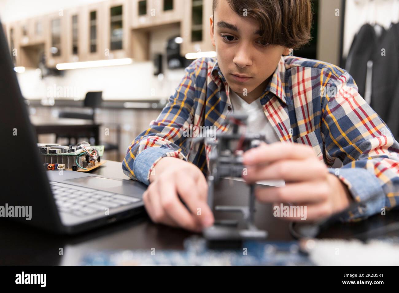 Hispanic teen in science class hi-res stock photography and images - Alamy