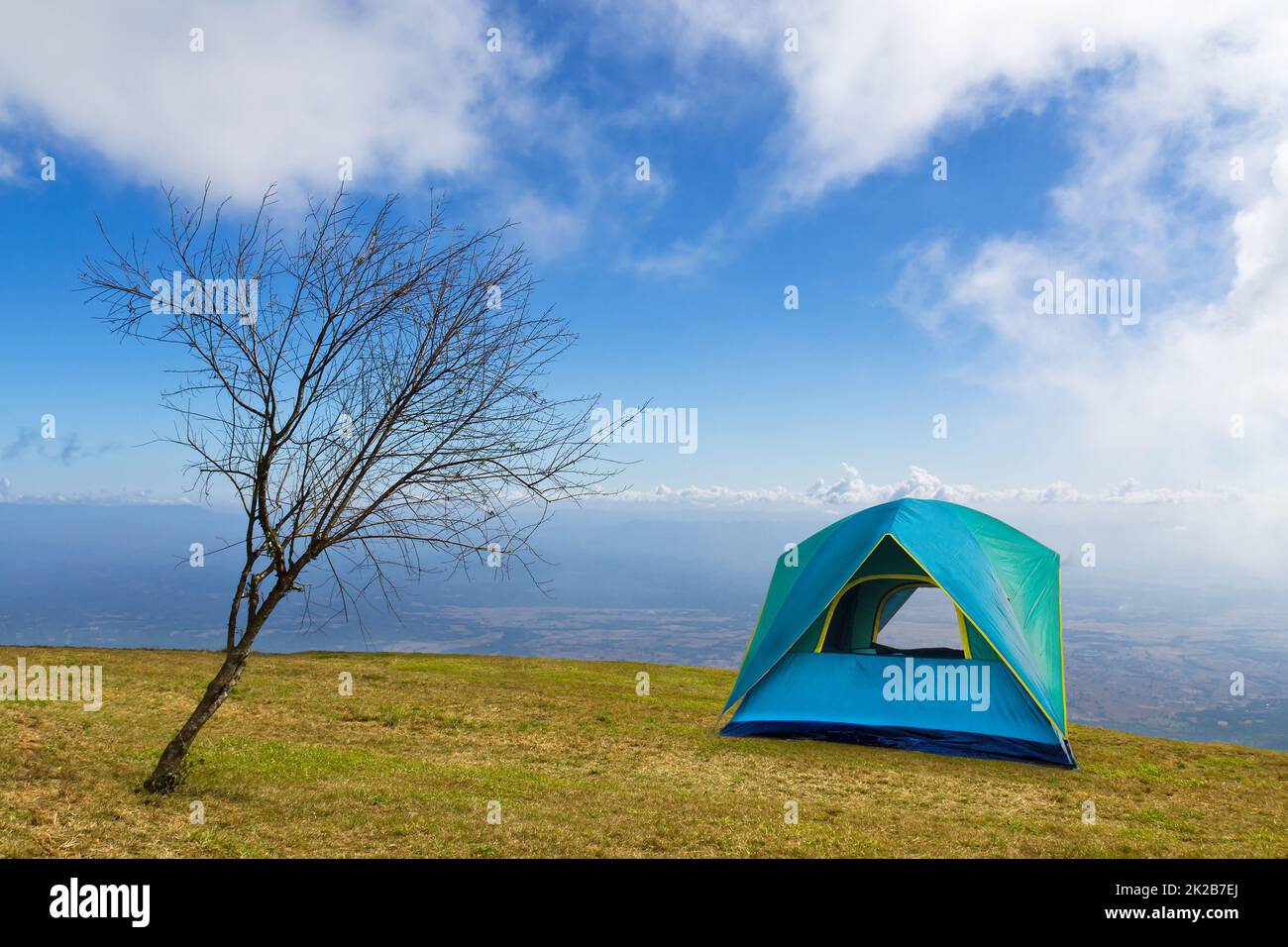 Tent camping with blue sky in morning time Stock Photo - Alamy