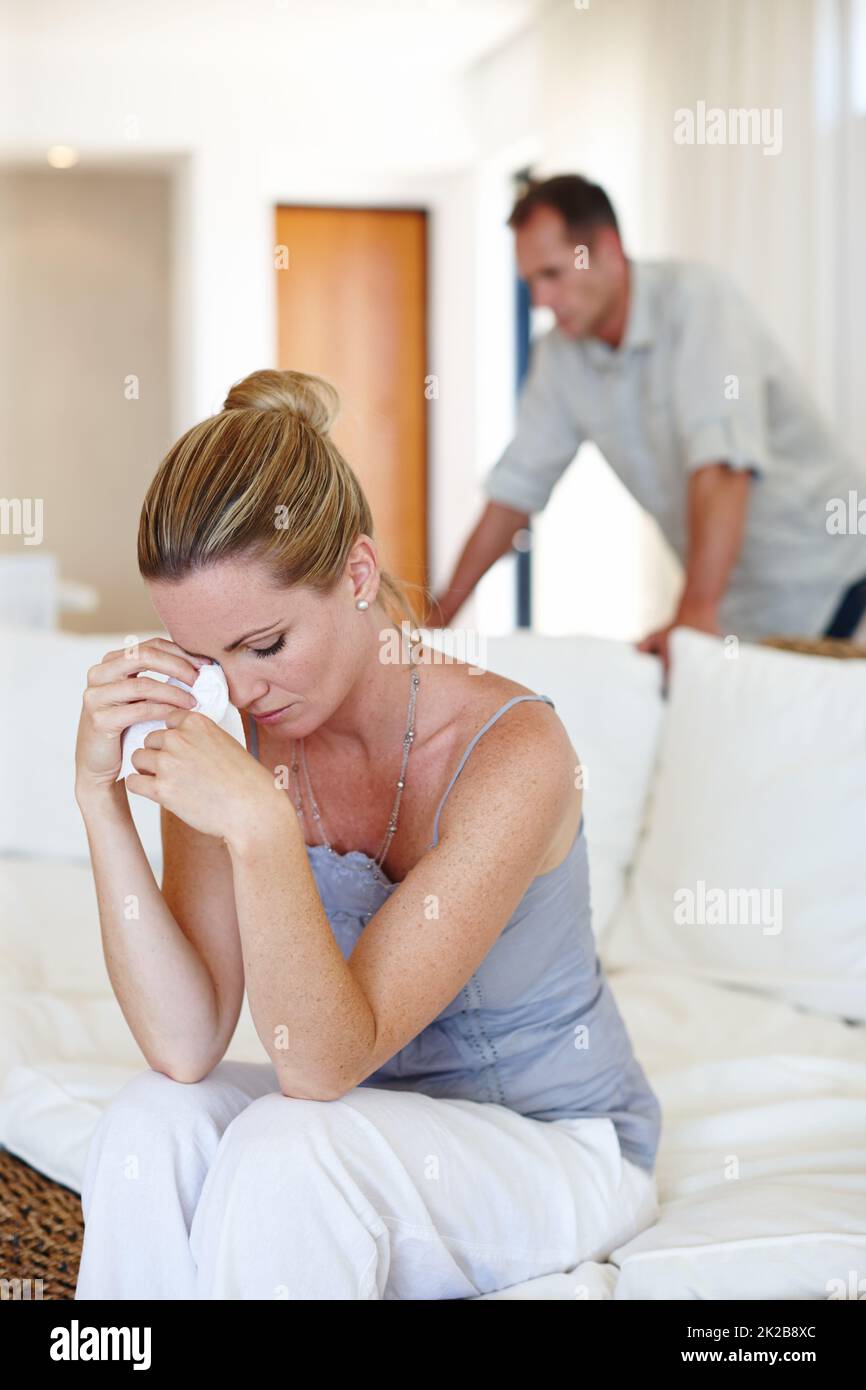 Woman sad husband background hi-res stock photography and images - Alamy