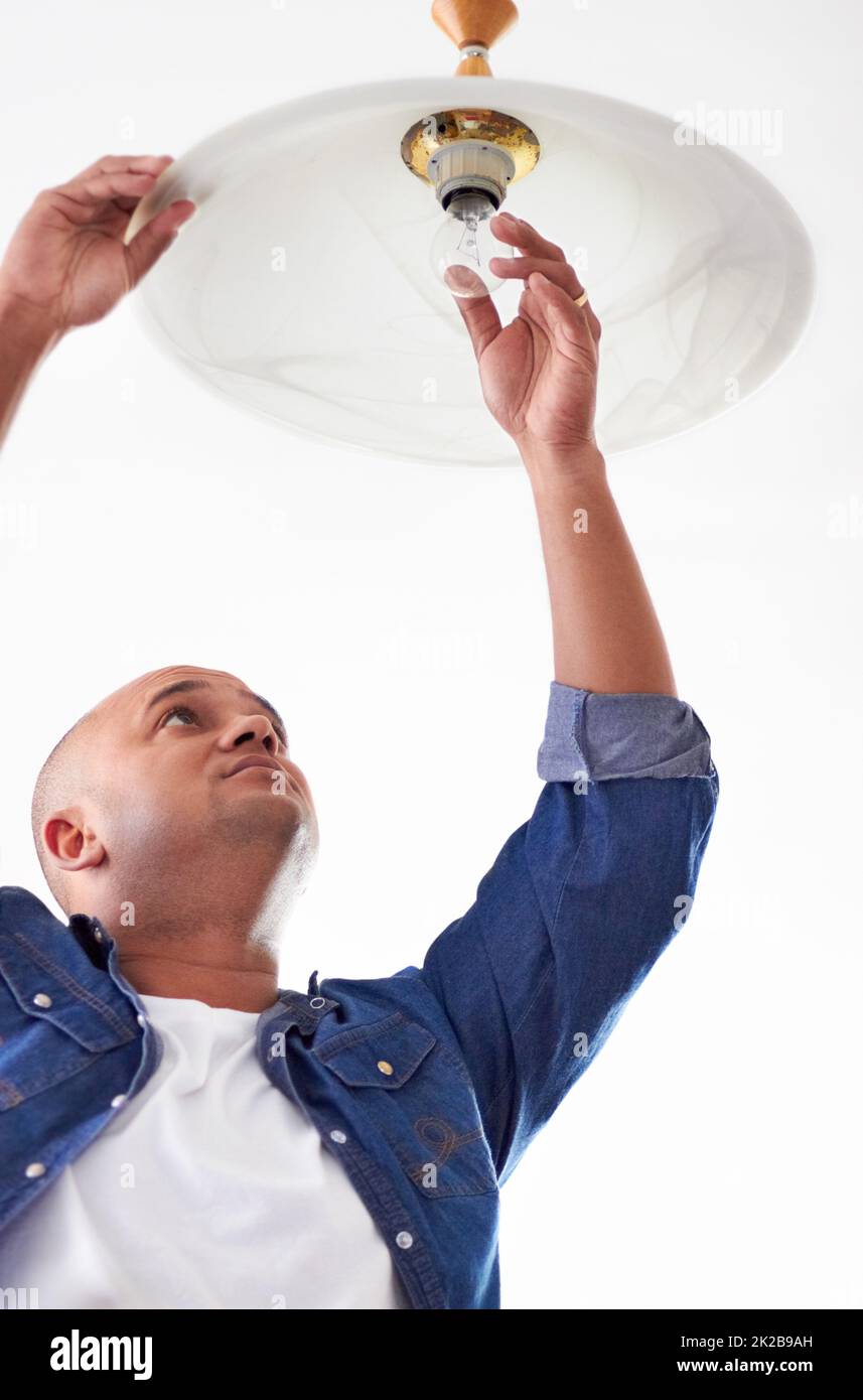 Person changing a lightbulb hi-res stock photography and images - Alamy