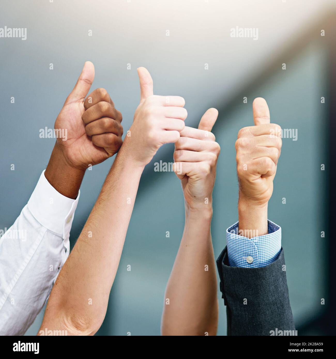 Group thumbs up employee hi-res stock photography and images - Alamy
