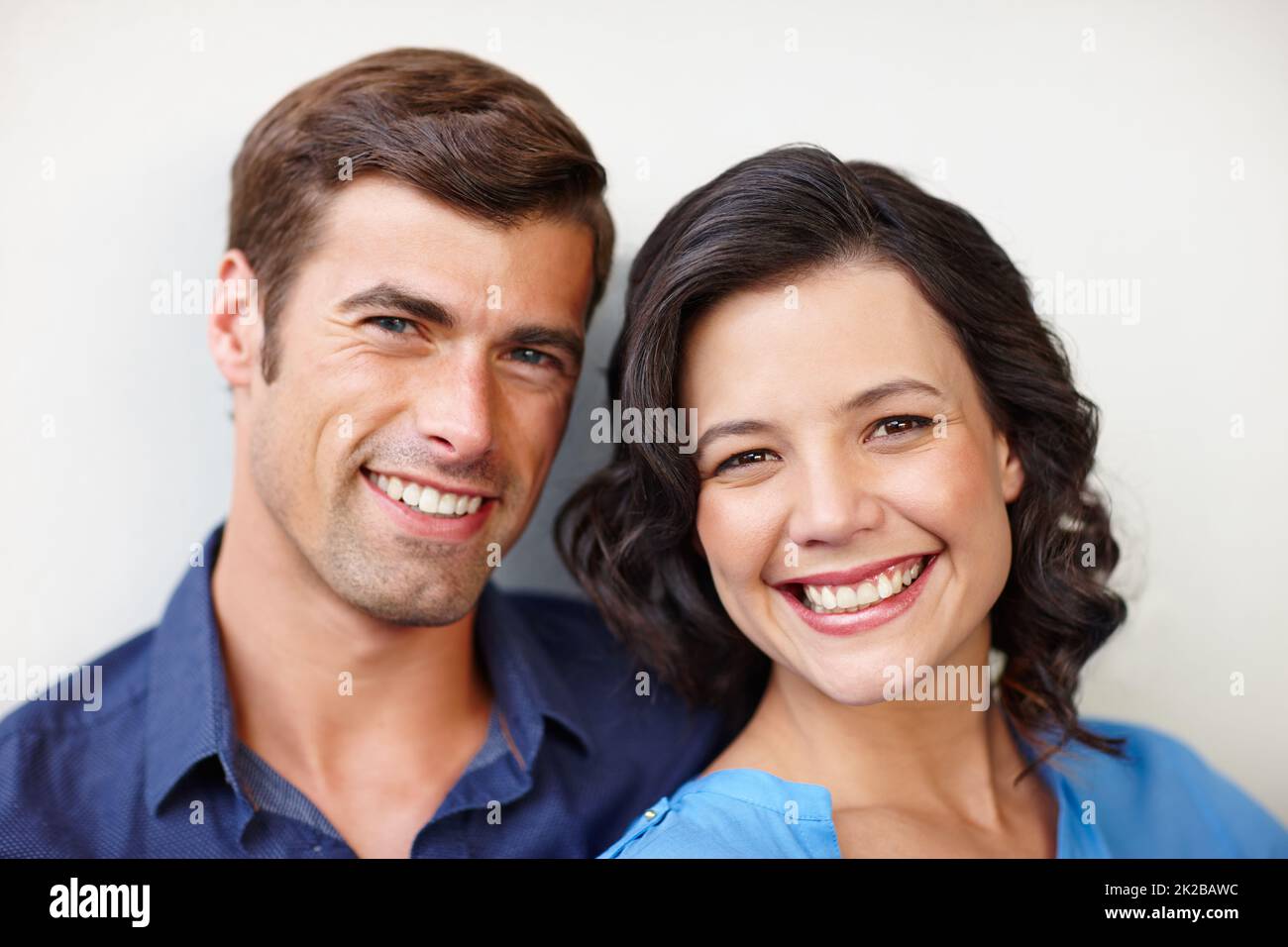 Live. Laugh. Love.. Portrait of a beautiful couple smiling happily ...