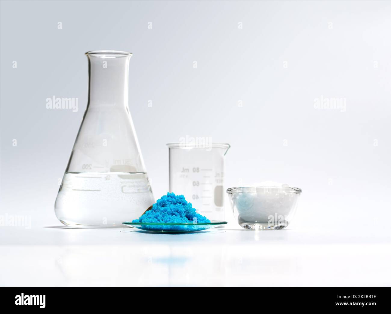 Cosmetic chemicals ingredient on white laboratory table. Copper(II ...