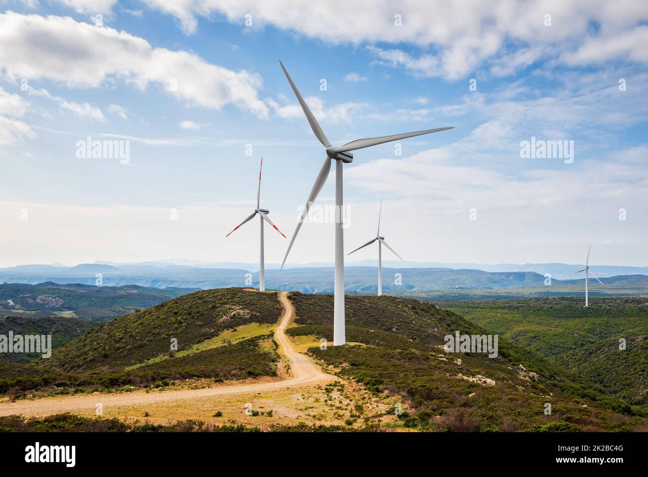 Turbines in a mountain wind farm. Ecological energy production Stock ...