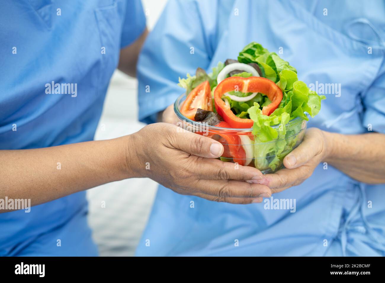 Asian senior or elderly old lady woman patient eating breakfast ...