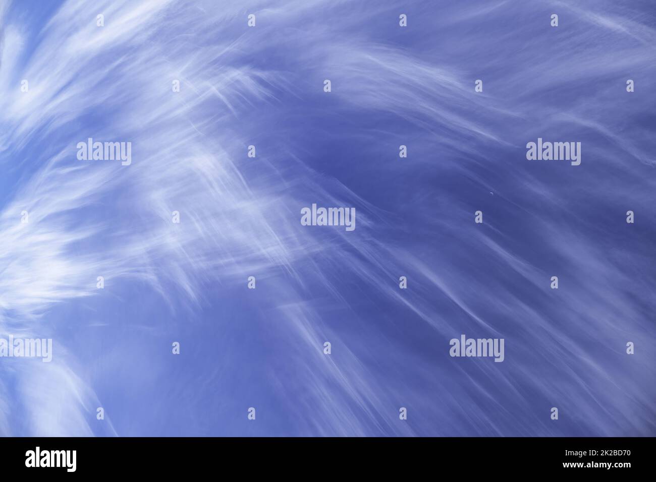 Blue sky with contrails Stock Photo - Alamy