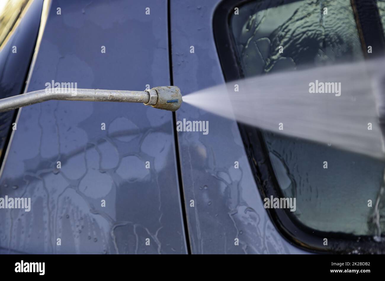 Washing car hose Stock Photo - Alamy