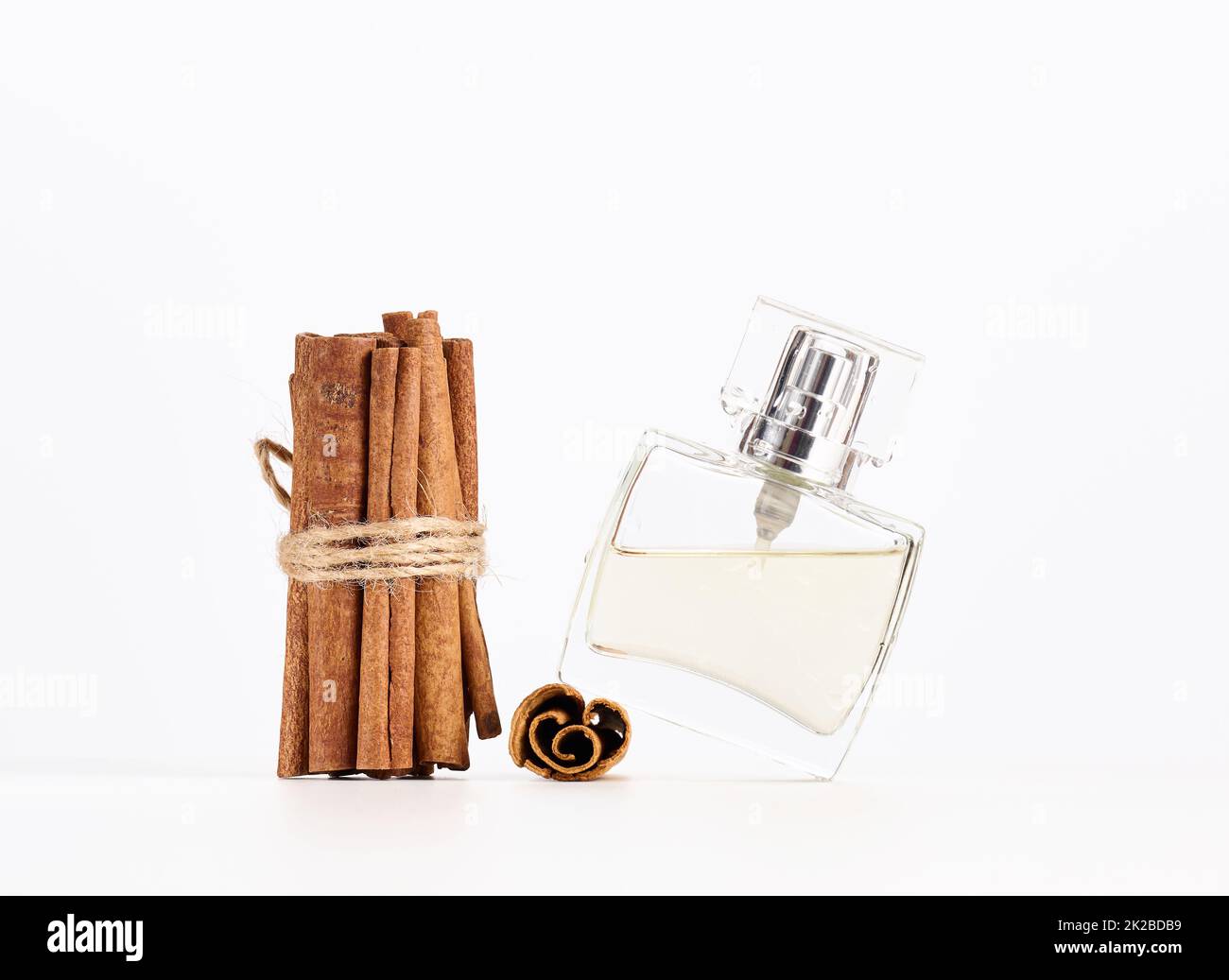 square glass perfume bottle on white background Stock Photo - Alamy