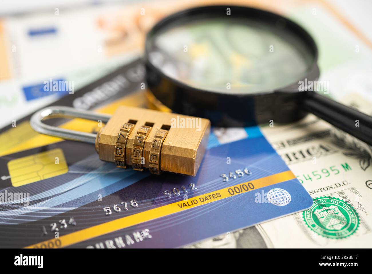 Credit card with password key lock on US dollar background Stock Photo ...