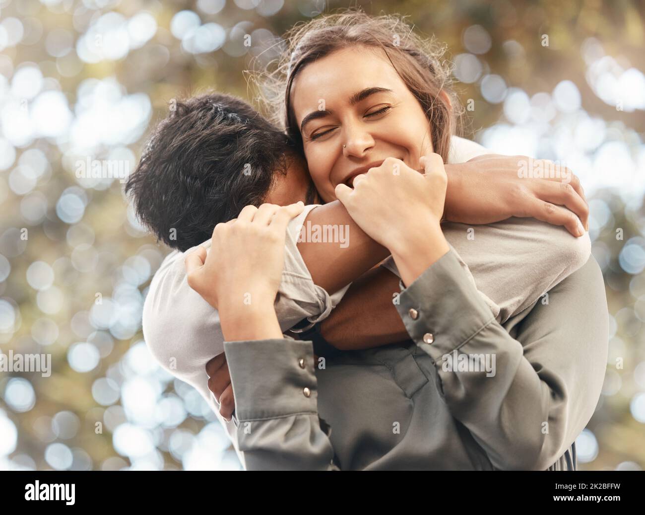 Couple smile, love and hug in outdoor, happy in marriage and support in ...