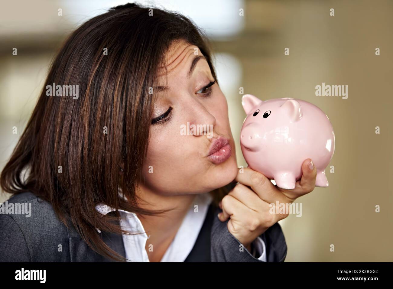 Cash is a girls best friend. An attractive businesswoman pulling a ...