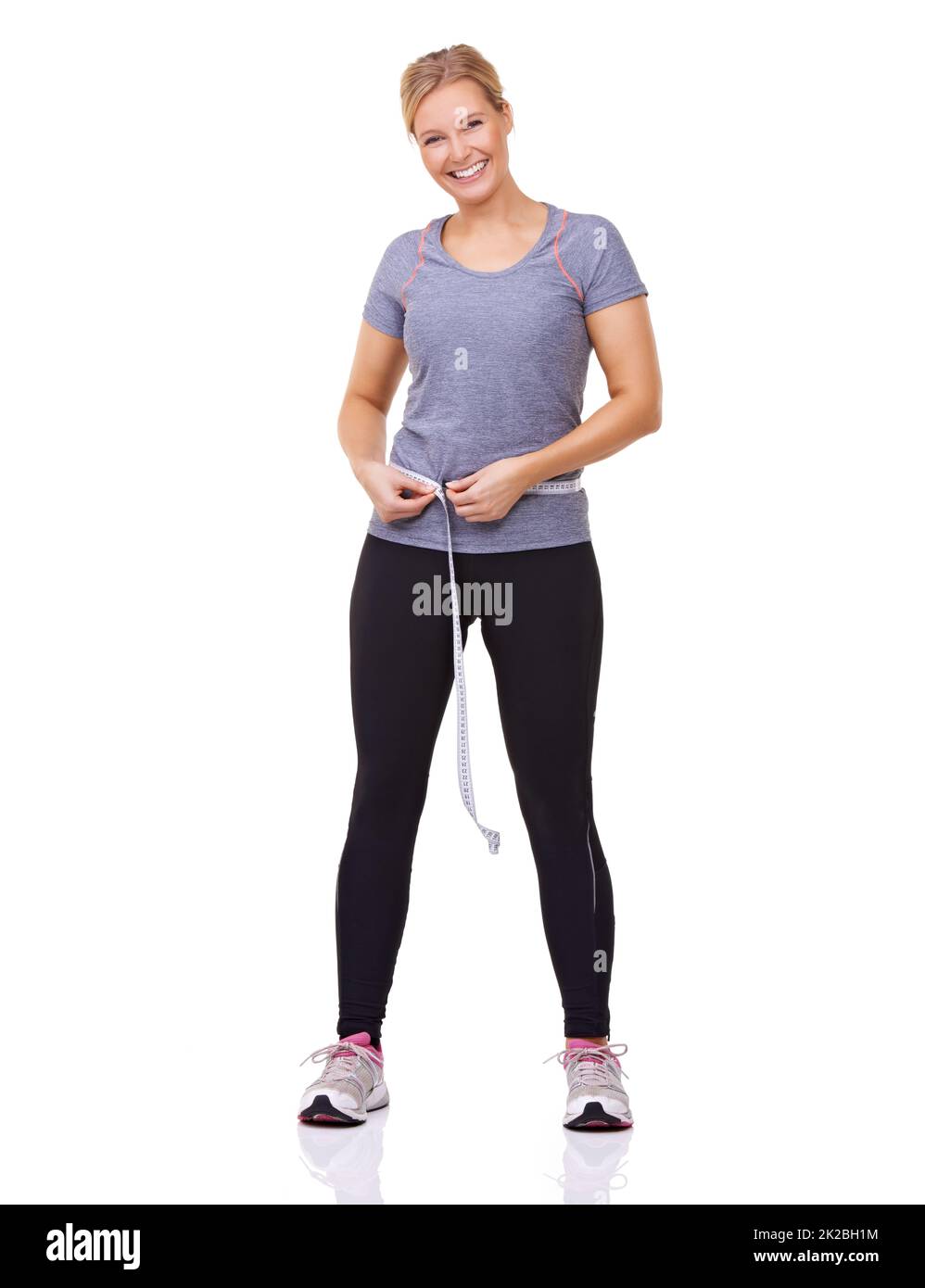 Pleased with her progress. Studio shot of an attractive young woman ...