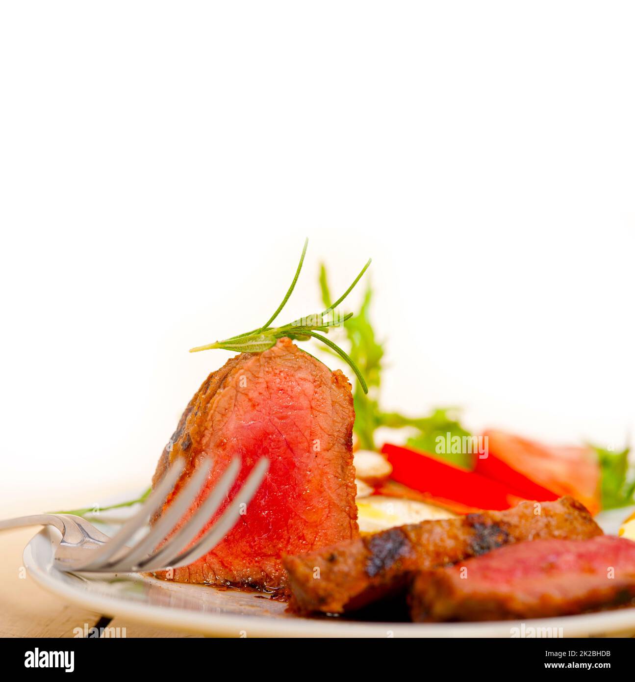 beef filet mignon grilled with vegetables Stock Photo - Alamy