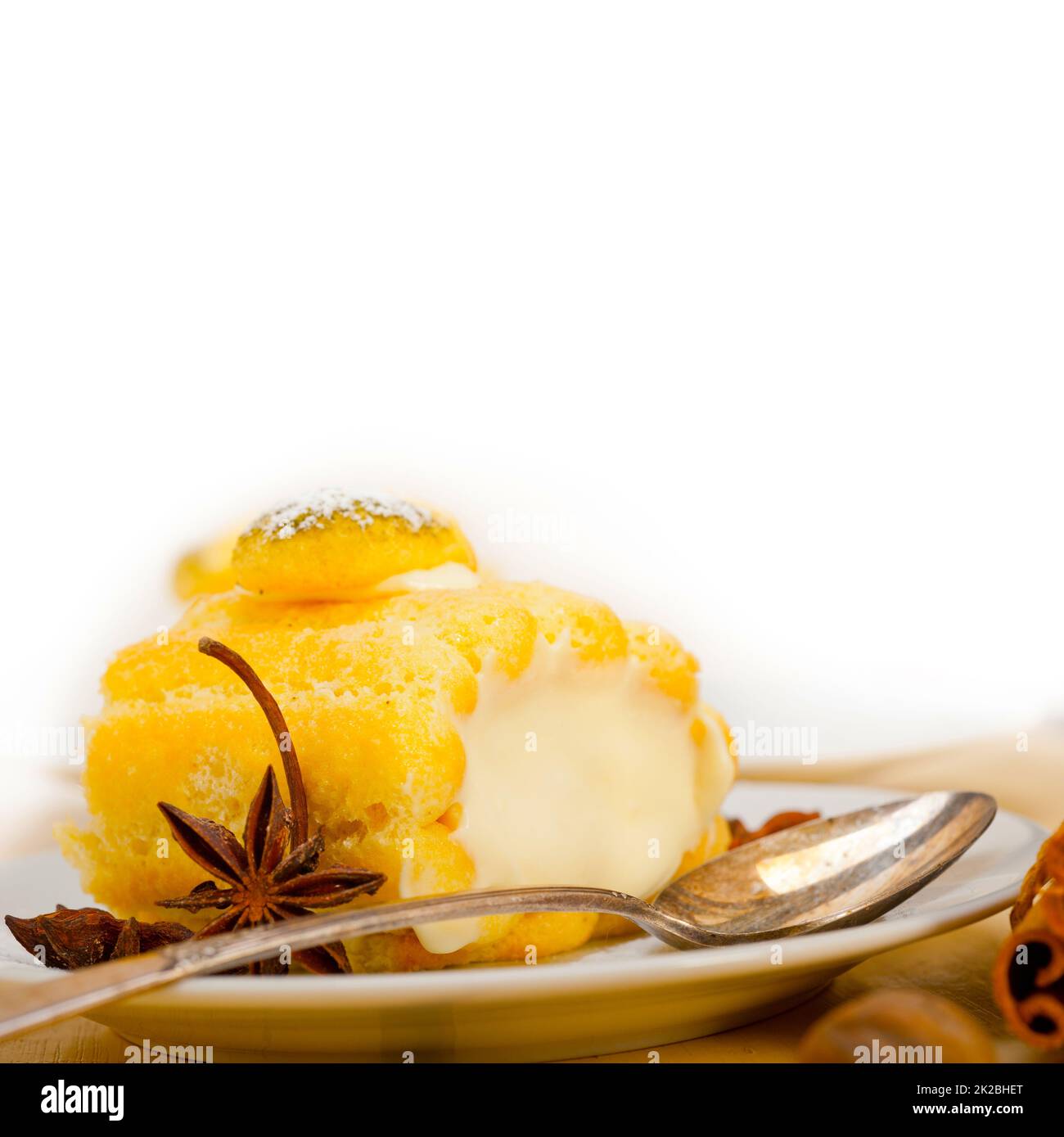 cream roll cake dessert and spices Stock Photo - Alamy