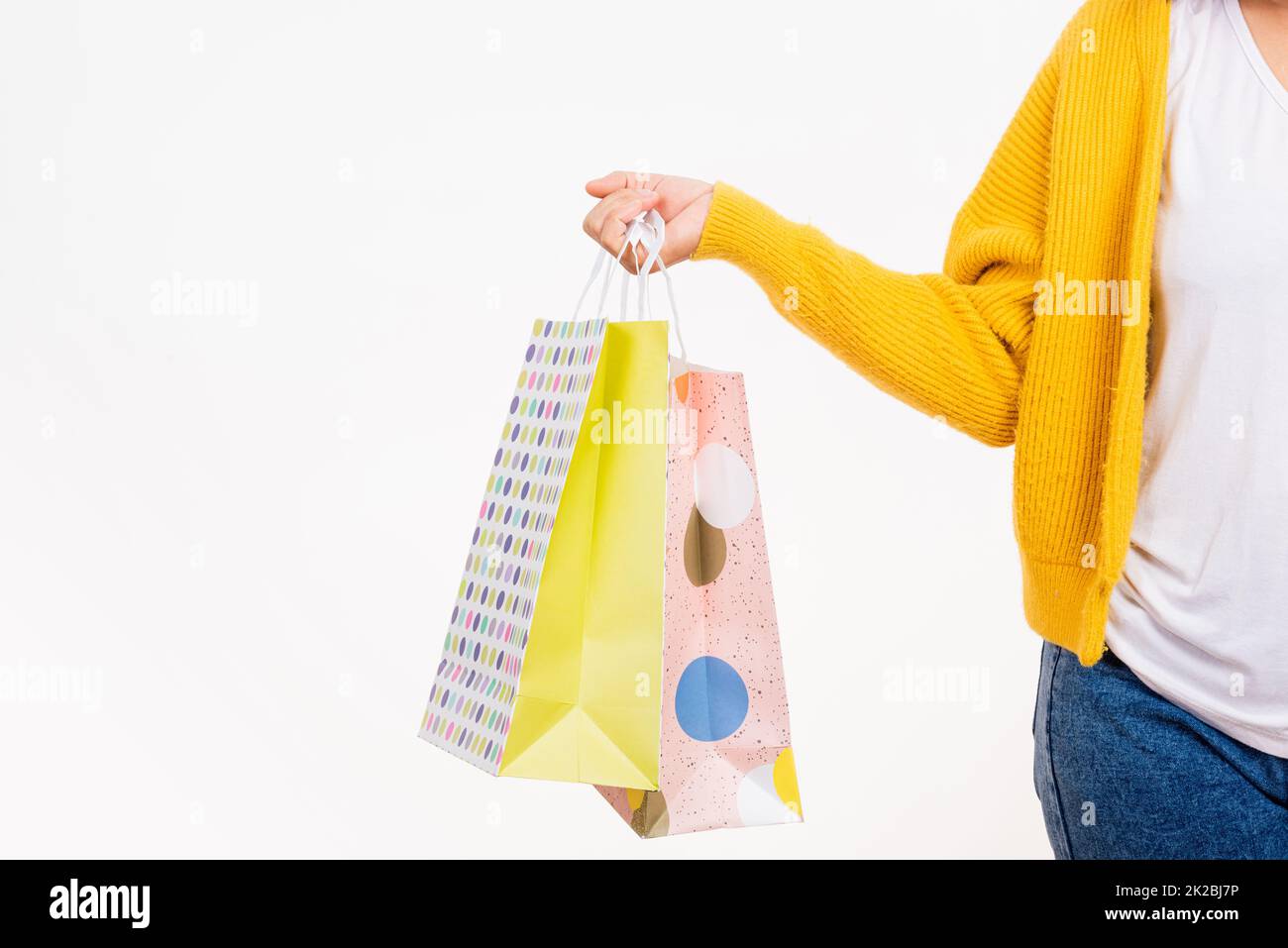 female hold many packets within arms Stock Photo - Alamy