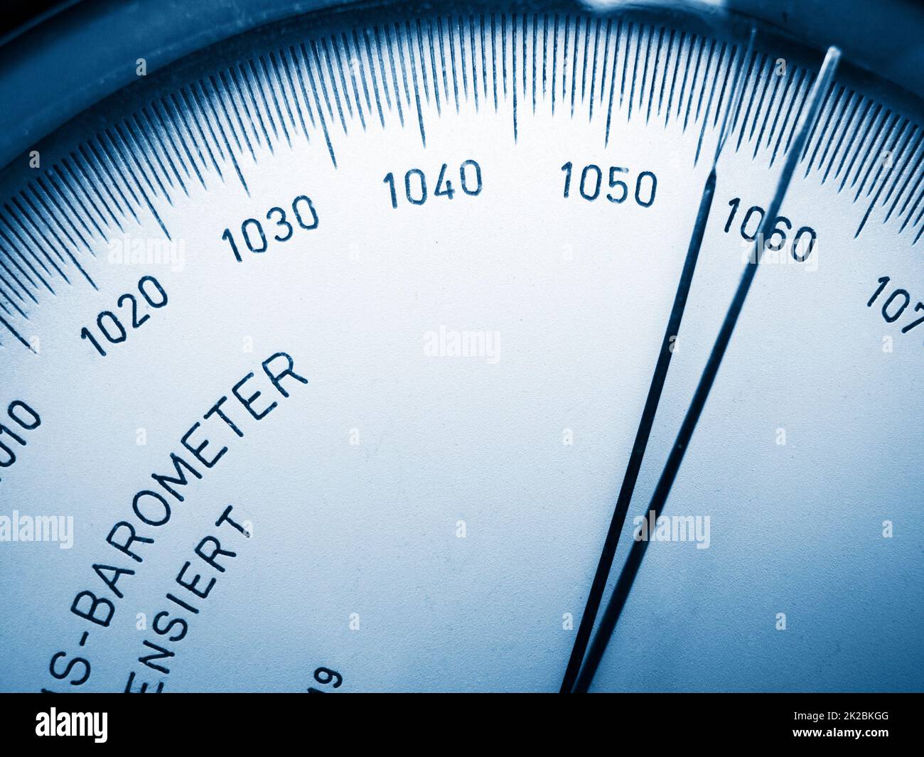 Dial of a barometer blue toned Stock Photo - Alamy