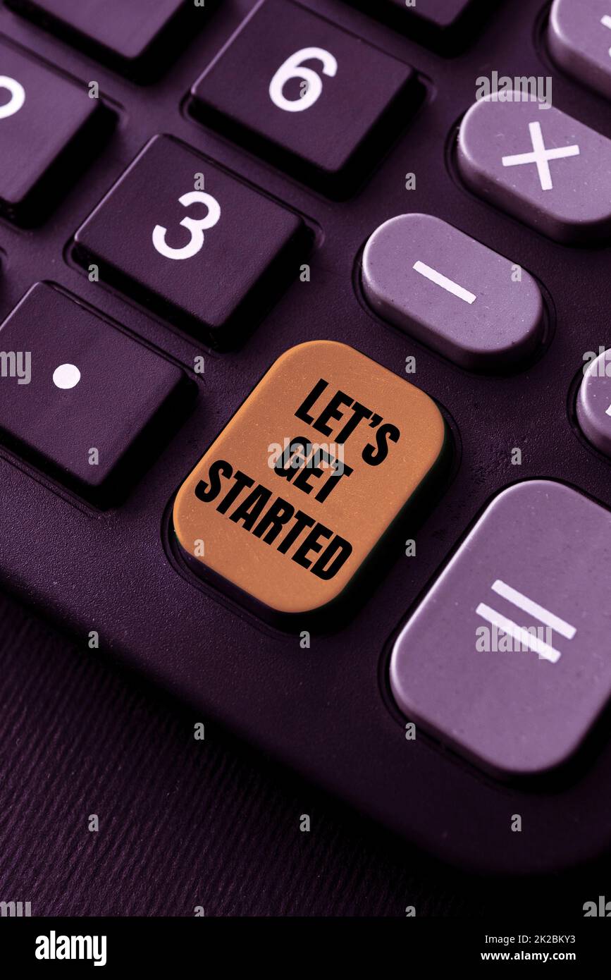 Hand writing sign Lets Get Started. Word for encouraging someone to ...