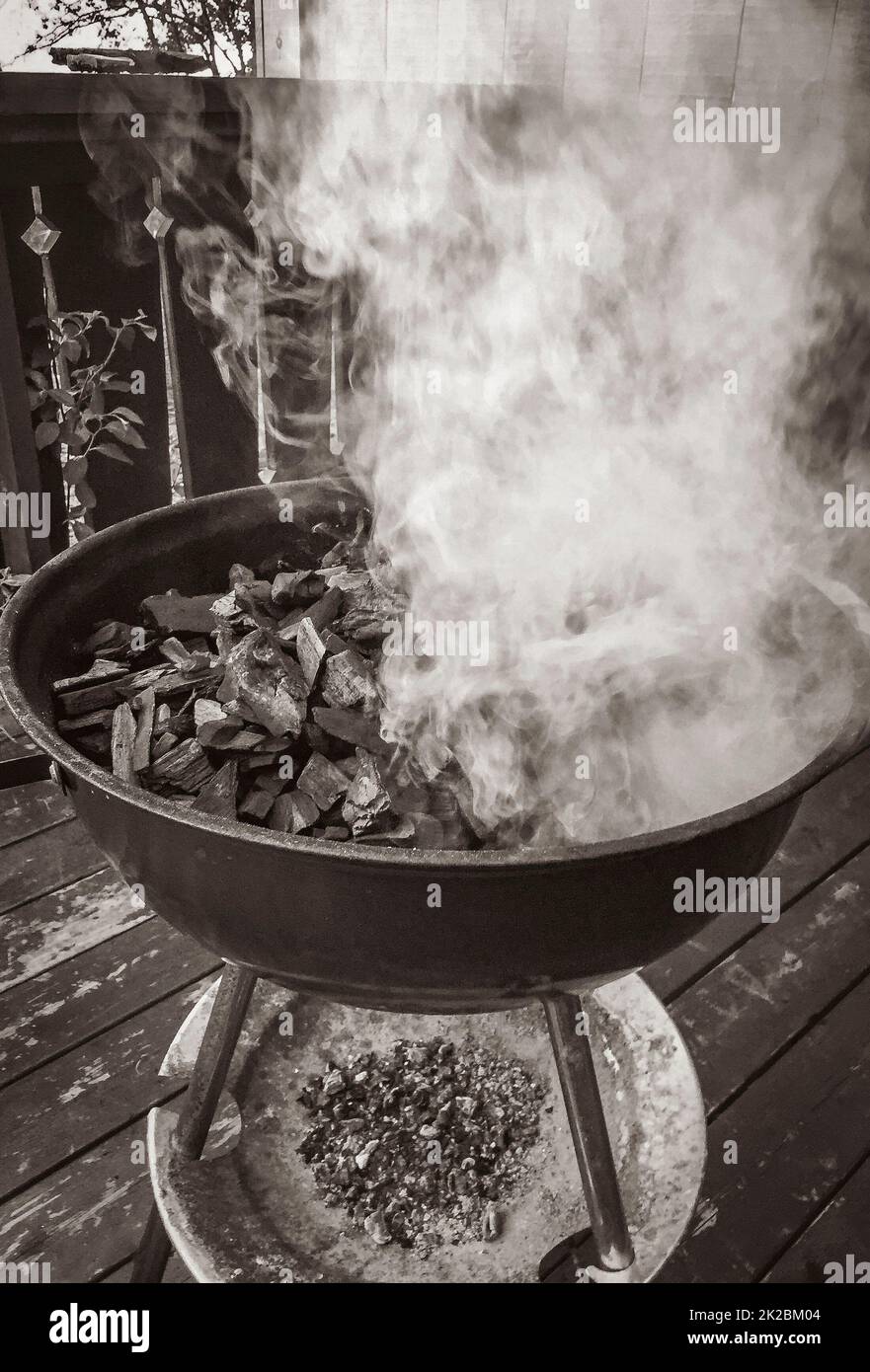 Glowing barbecue charcoal fire smoke when turning on barbecue Norway ...