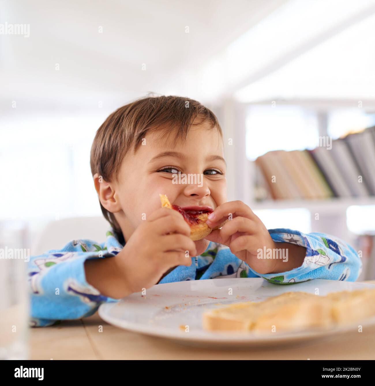 Cute boy is eating hi-res stock photography and images - Alamy