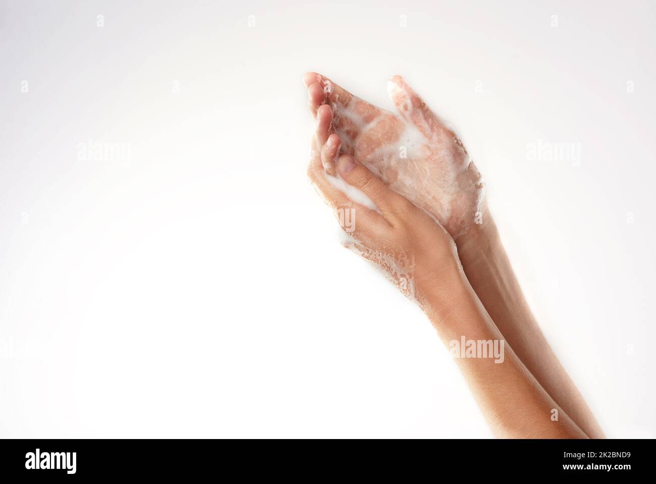 Cleansing is the key to beautiful skin. Closeup studio shot of a woman ...