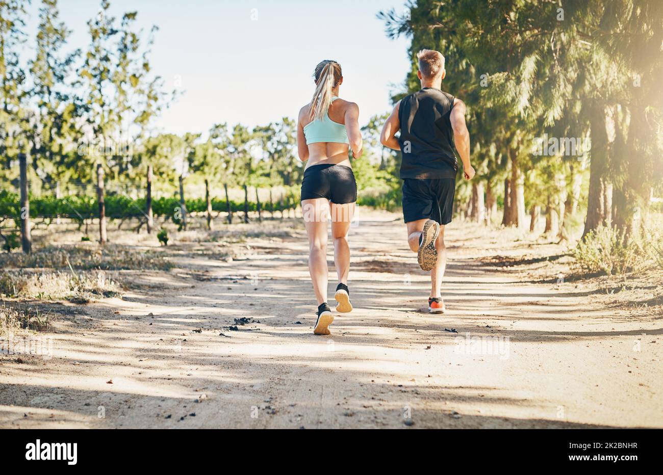 Women running together park hi-res stock photography and images - Alamy