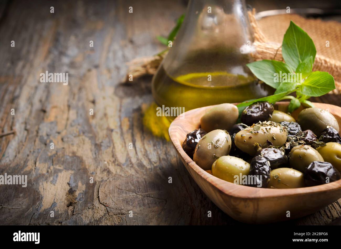 Olive oil fresh olives rustic wood hi-res stock photography and images ...