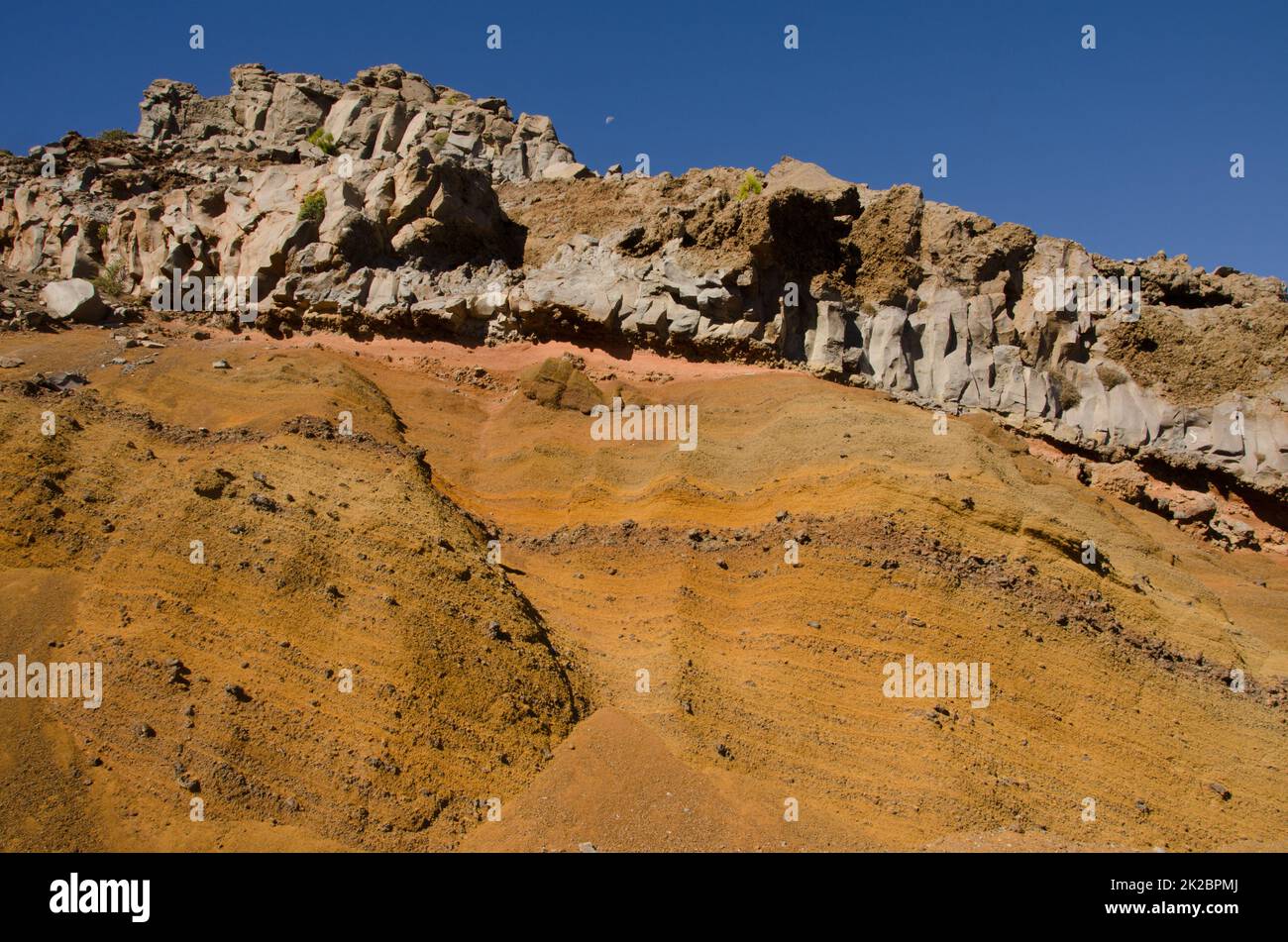 Cliff with volcanic tuff and basaltic rock Stock Photo - Alamy