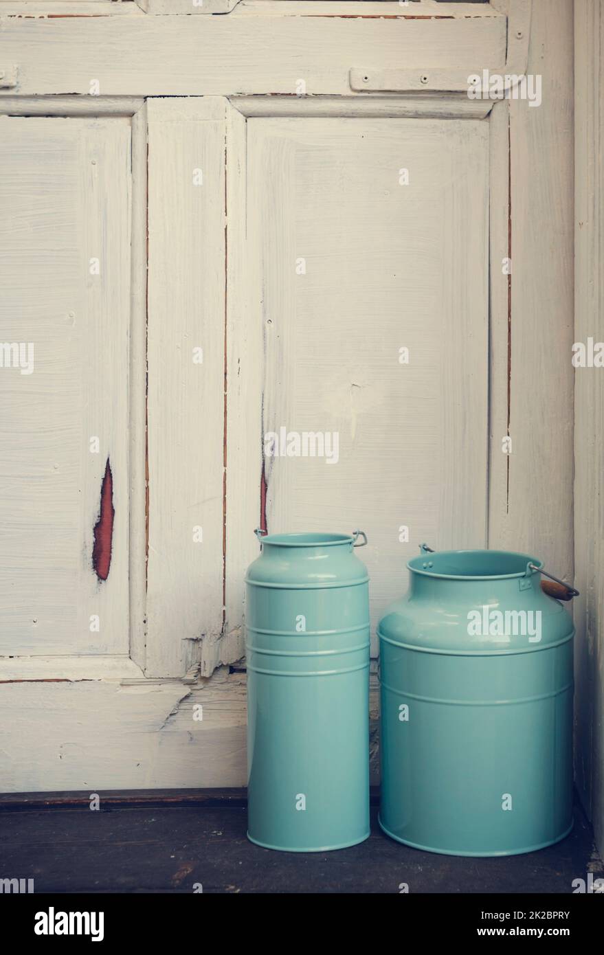 Vintage milk canisters Stock Photo - Alamy