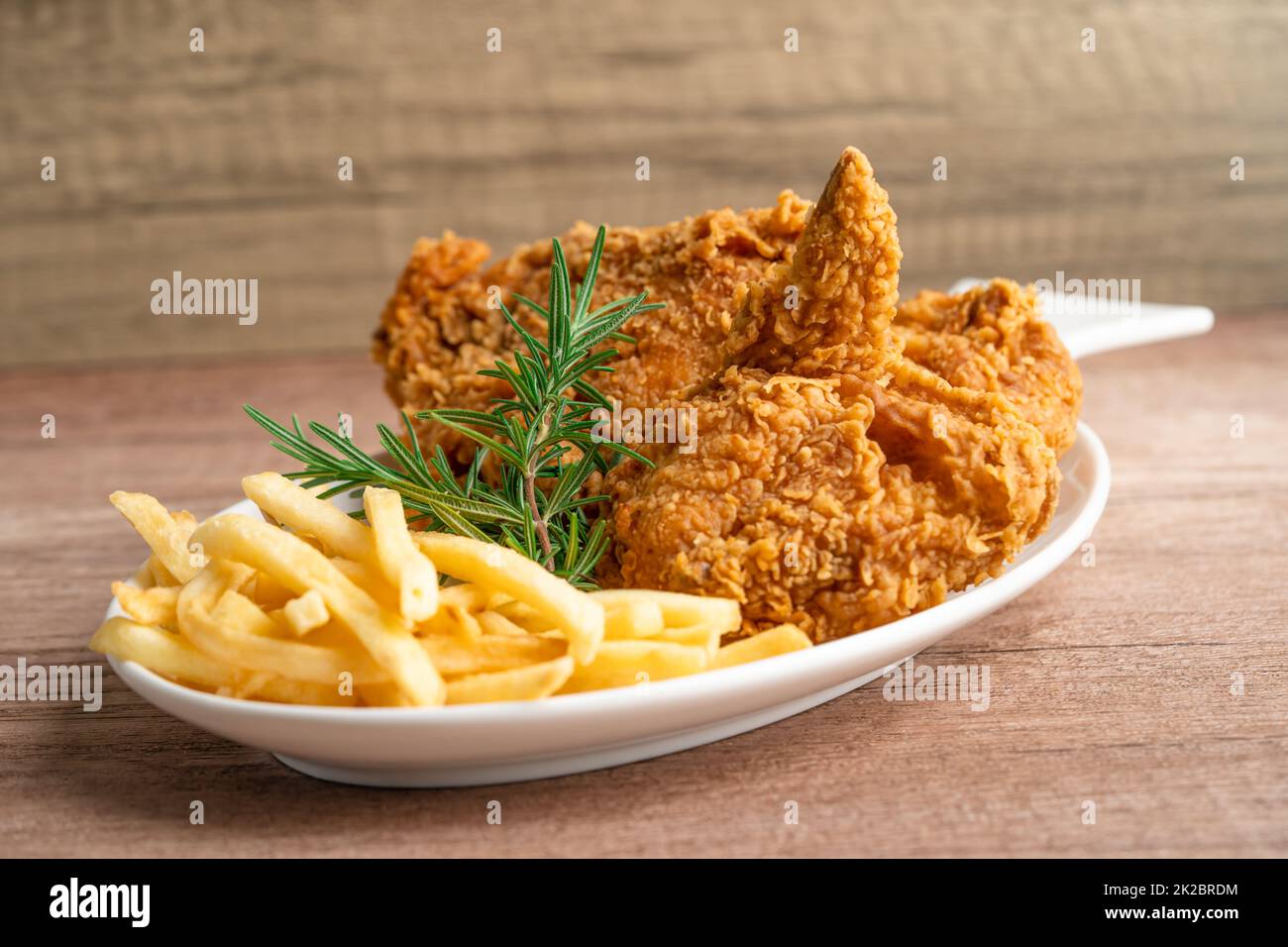 Fried chicken and potato chip with rosemary leaf, Junk food high ...