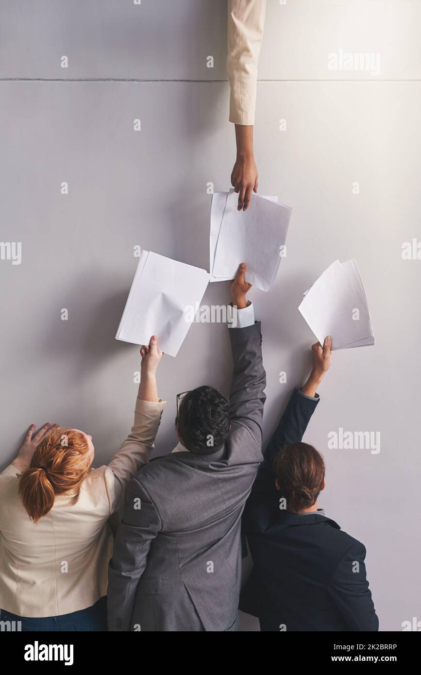 Handing in documents hi-res stock photography and images - Alamy