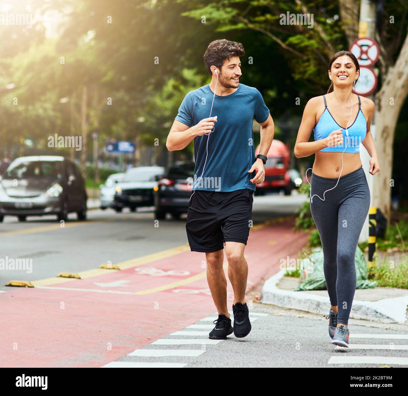 The fitness journey is made easier together. Shot of a sporty young ...