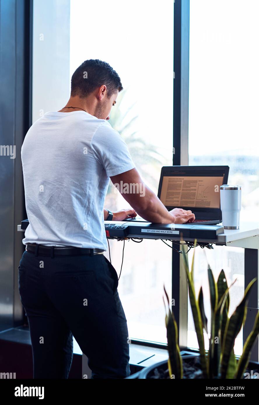 Professional man walking laptop computer hi-res stock photography and ...