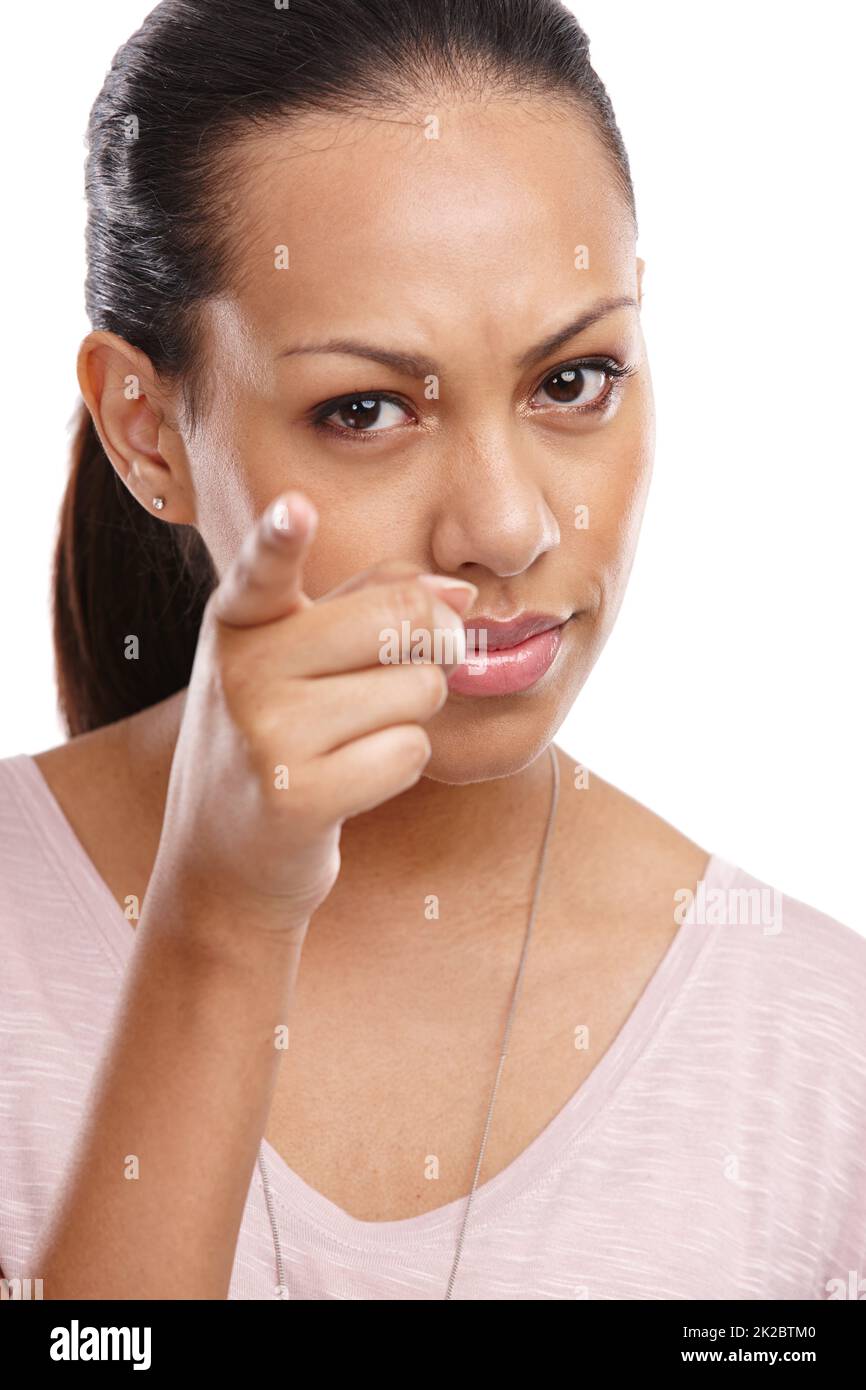 Im not done with you. Cropped shot of an angry young woman pointing a ... Im not done with you. Cropped shot of an angry young woman pointing a ...